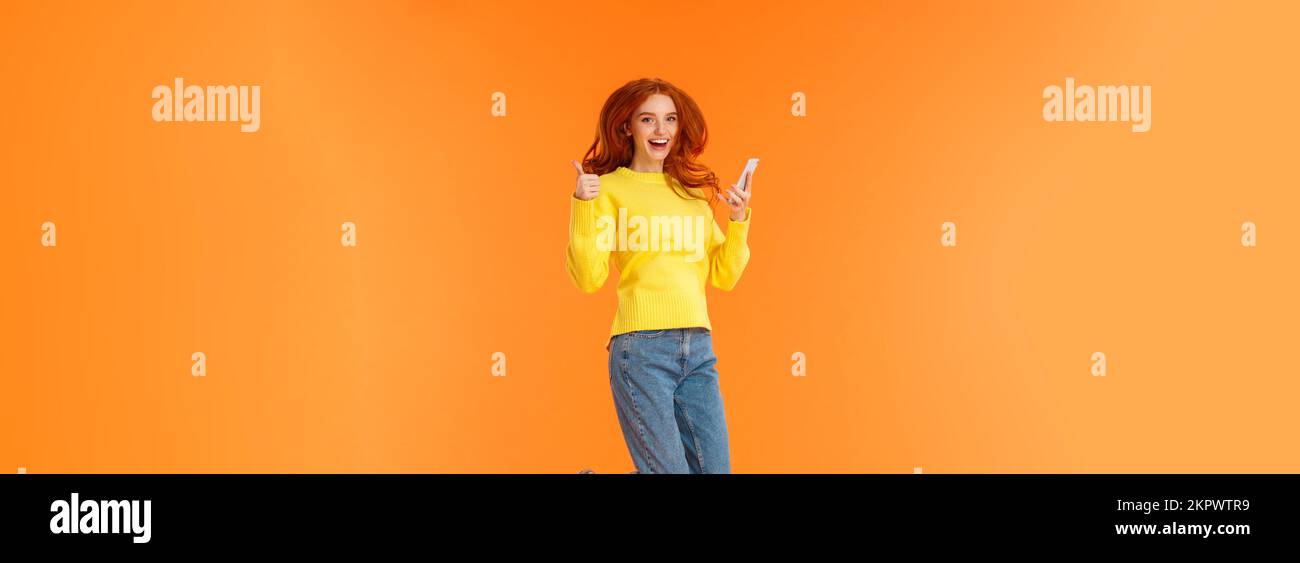 Vertical full-length shot carefree, excited and pleased good-looking ...