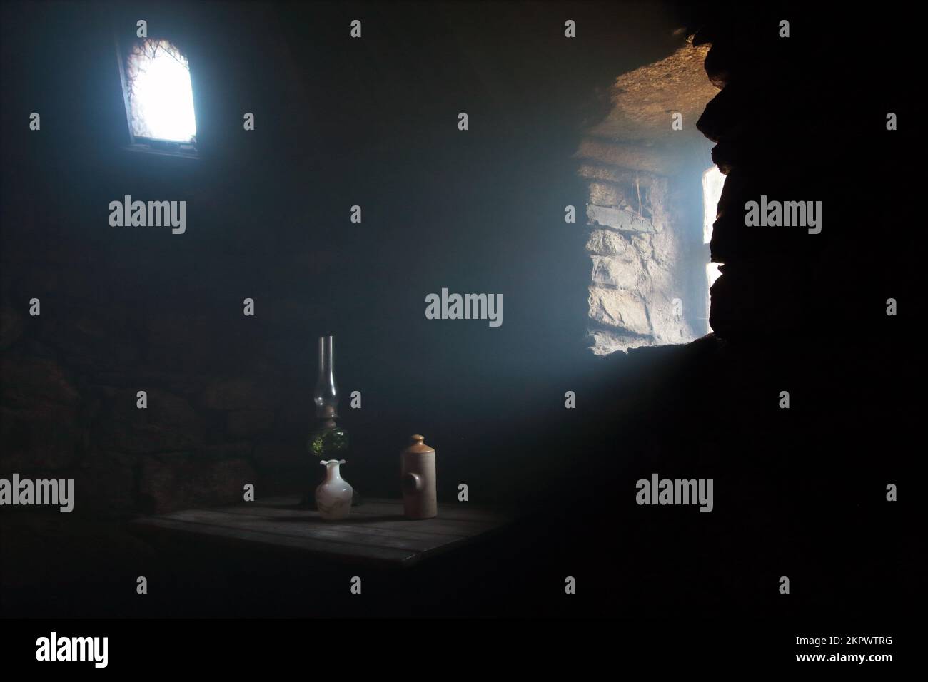 Sunlight beam enters an old hay barn Stock Photo - Alamy