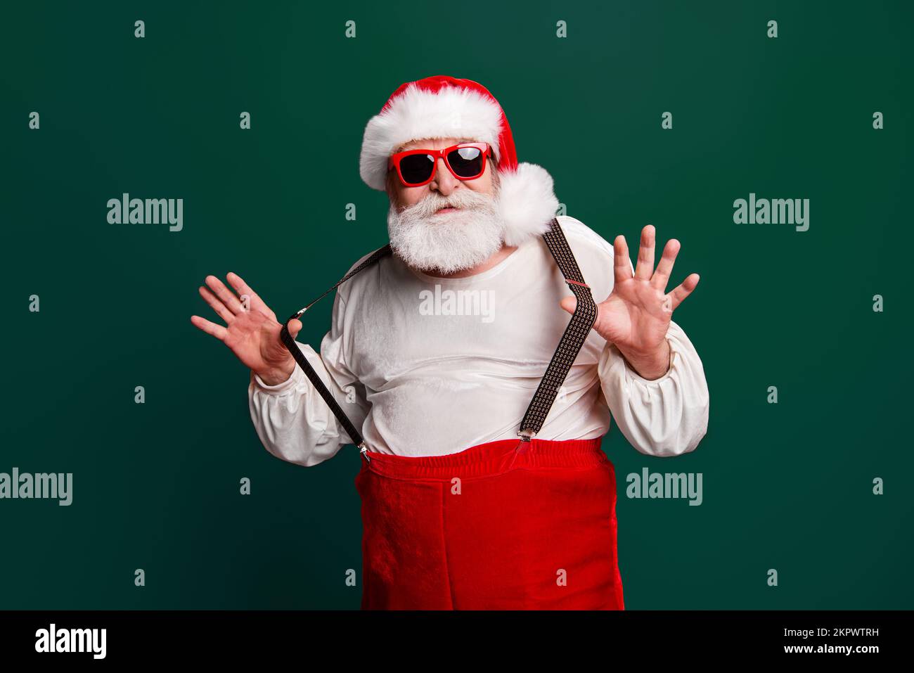 Portrait of cheerful positive dreamy funky Santa congratulations best ...
