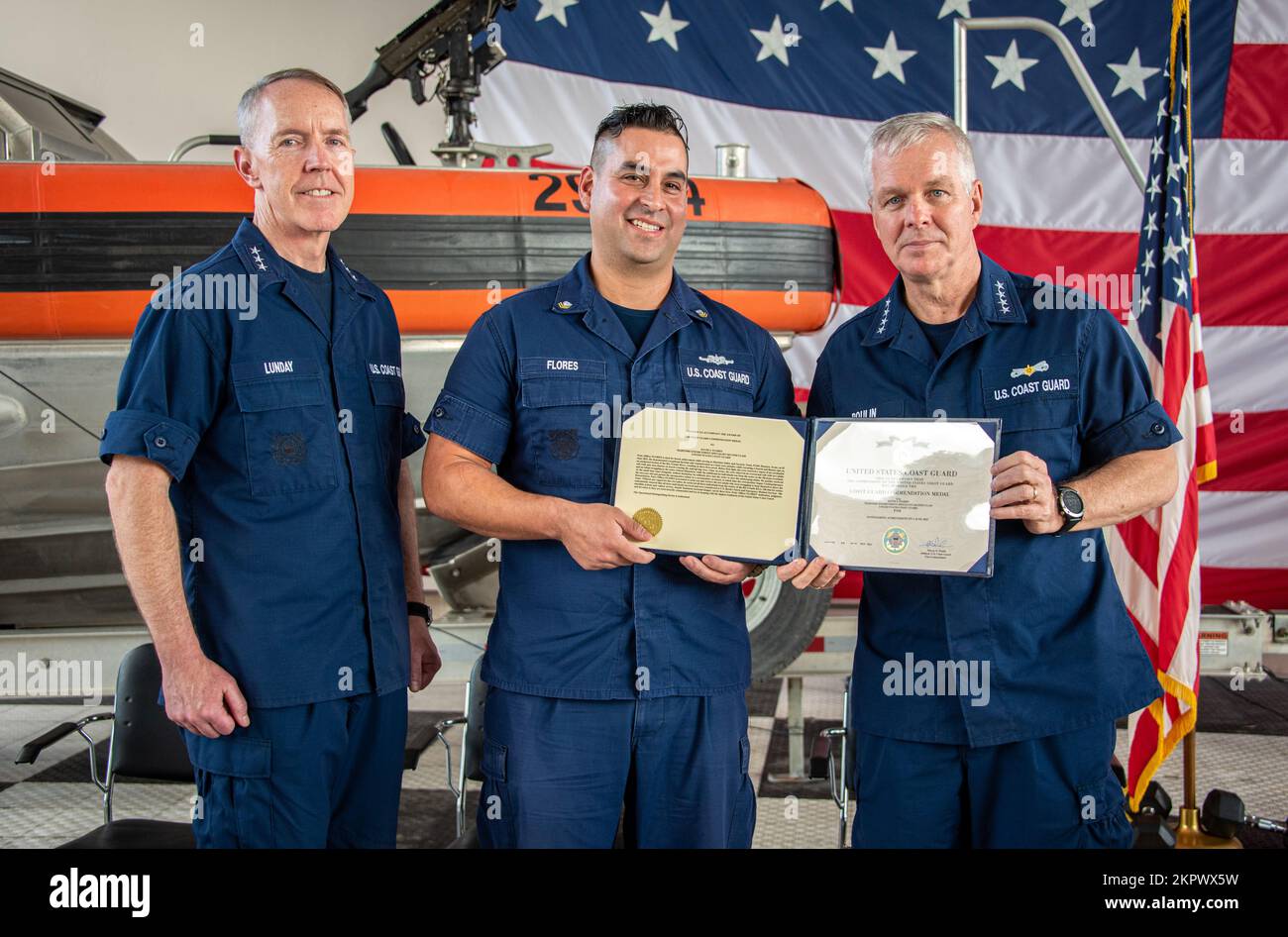 Coast Guard Petty Officer 2nd Class Jake Flores, a maritime enforcement ...