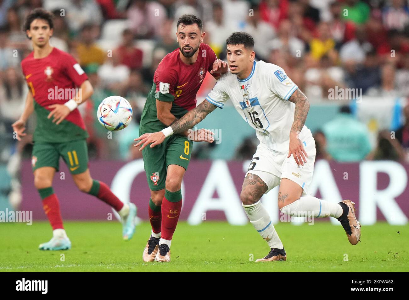Bruno Fernandes of Portugal and Mathias Olivera of Uruguay during the ...