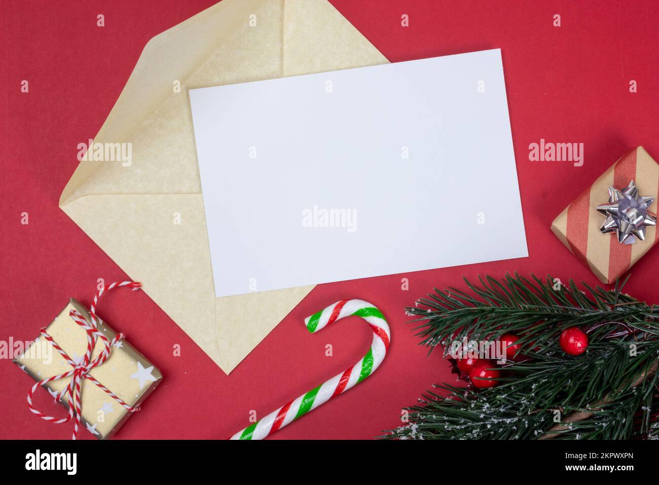 Christmas letter mock up with golden envelope and blank empty white ...