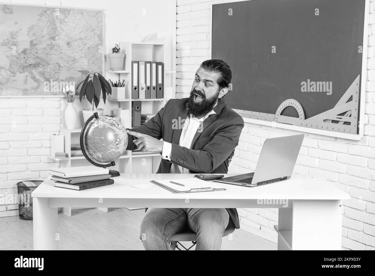 pass the exam. learning the subject. geographer. happy man with beard ...