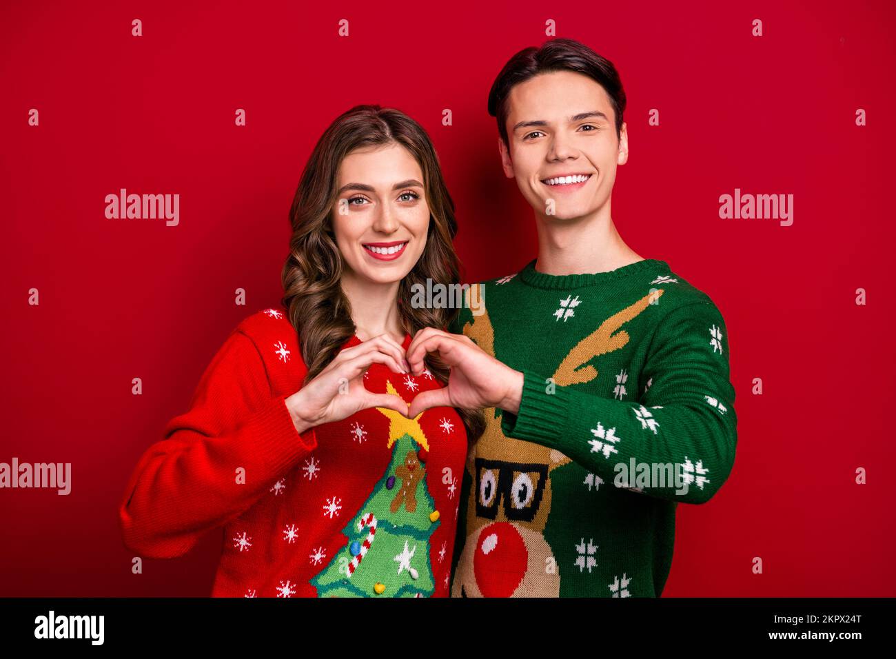 Photo of two cheerful idyllic partners touch hands fingers showing ...