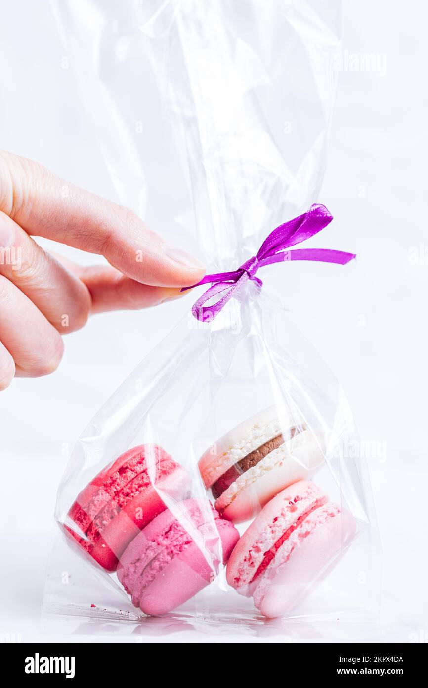 Close up of Macaroons in different colours on bright white background ...