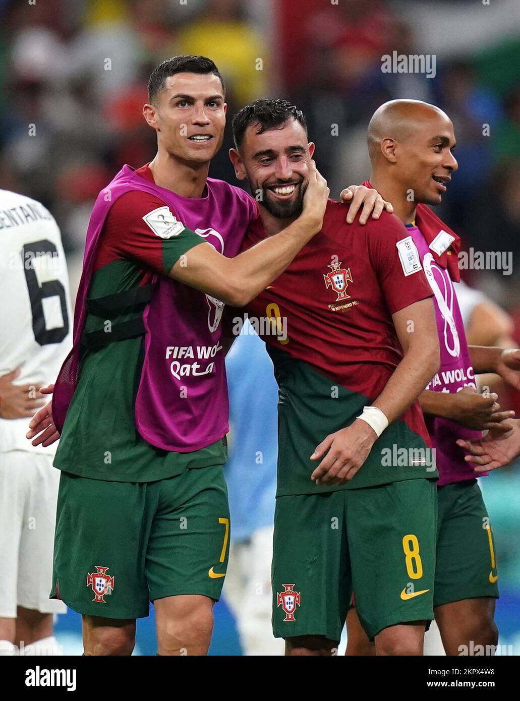 Portugal's Cristiano Ronaldo (left) and Bruno Fernandes embrace after ...