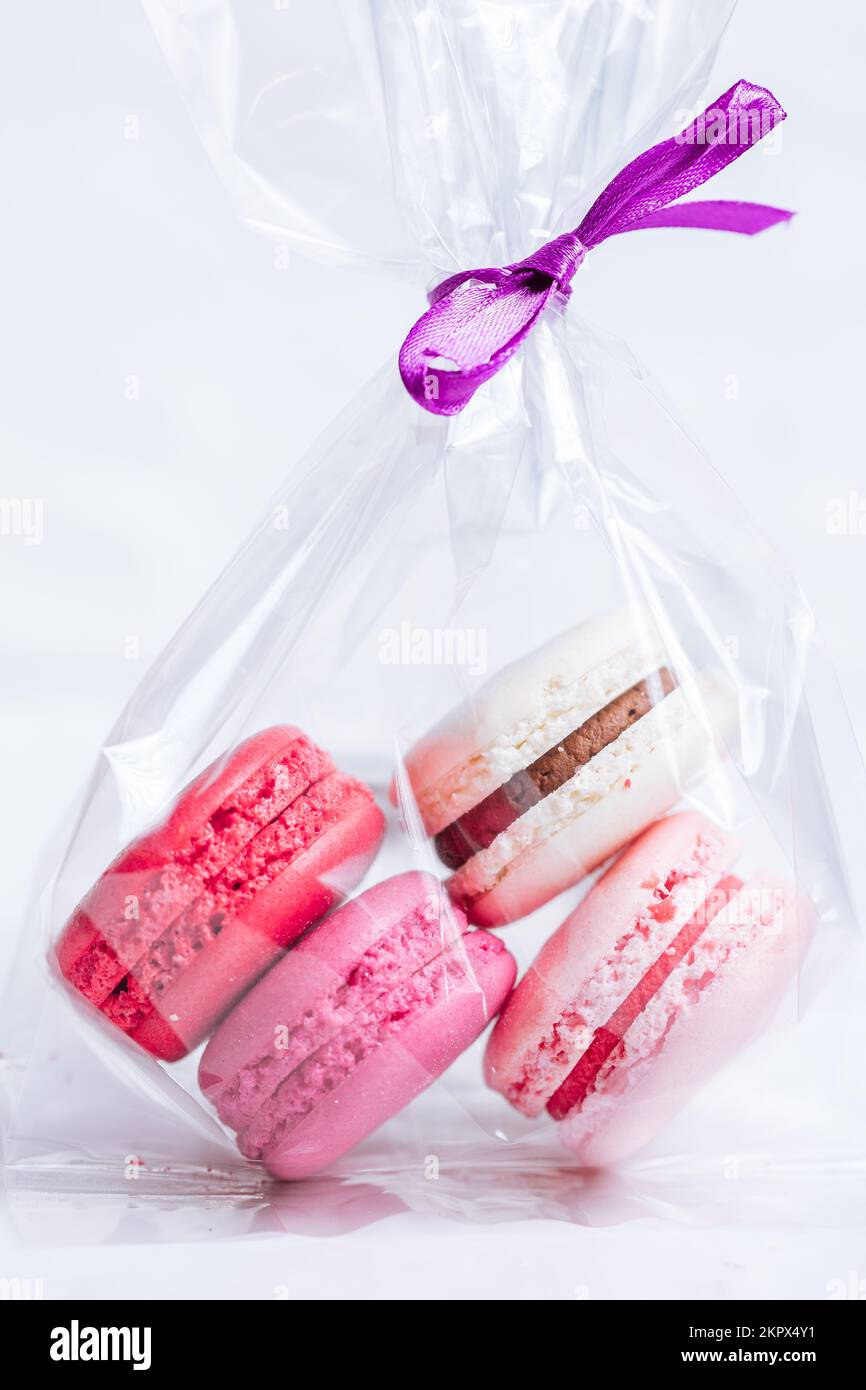 Close up of Macaroons in different colours on bright white background ...