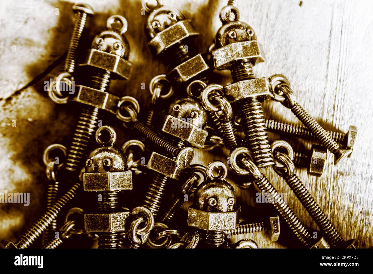 Vintage toy factory scene in a heap of antique screw and nut bots in ...