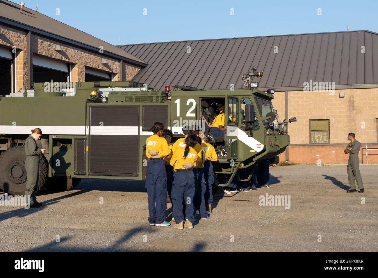 Students with Sprayberry High School receive a tour of the Oshkosh P ...