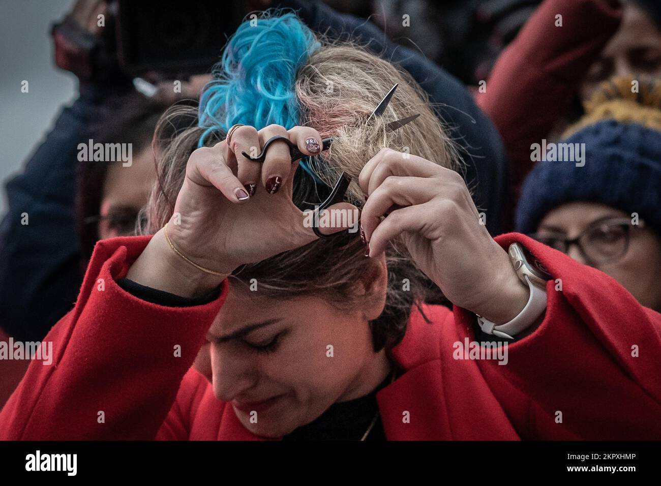 London, UK. 26th November, 2022. Iranian hair cutting protest. Dozens ...