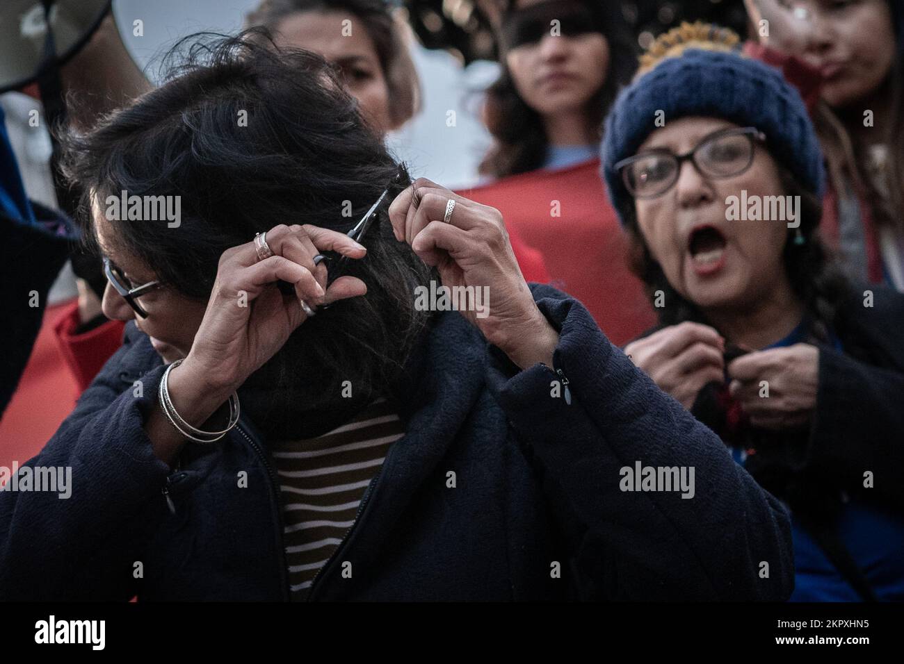 London, UK. 26th November, 2022. Iranian hair cutting protest. Dozens ...