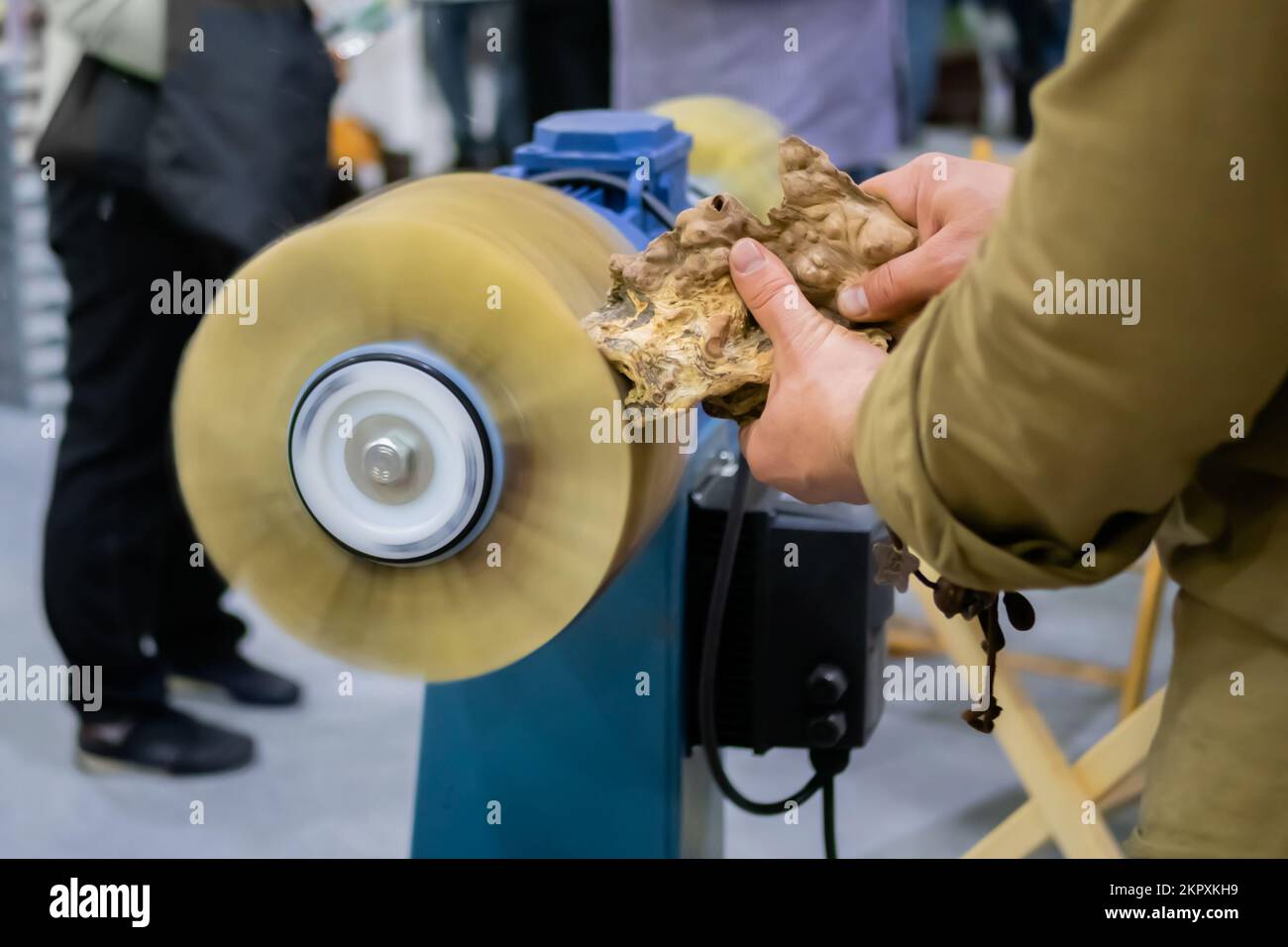 Professional man carpenter hands using belt sander machine Stock Photo ...