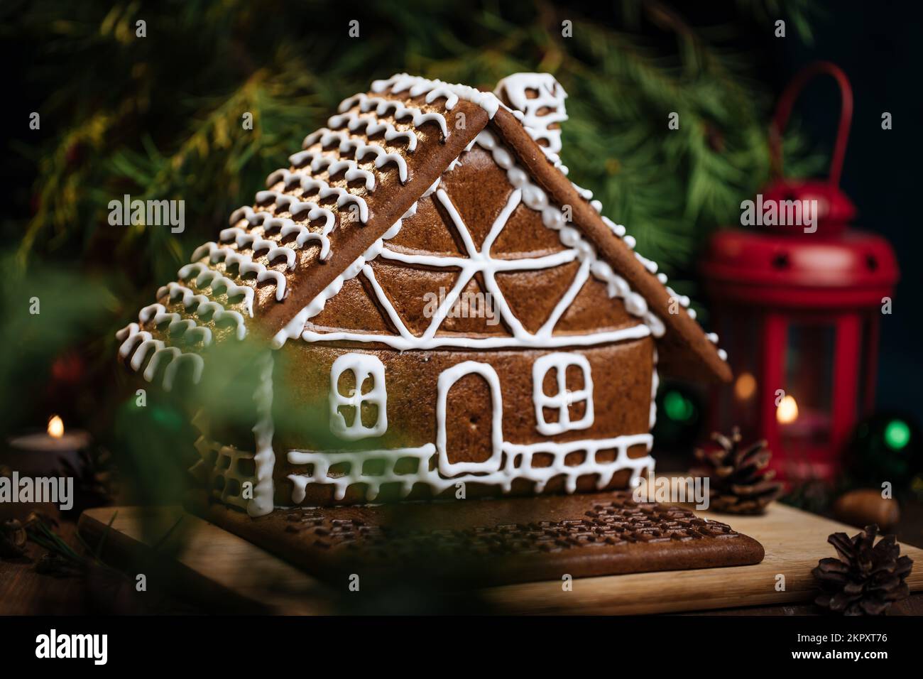 Gingerbread house with pine tree in background. Marry Christmas and ...