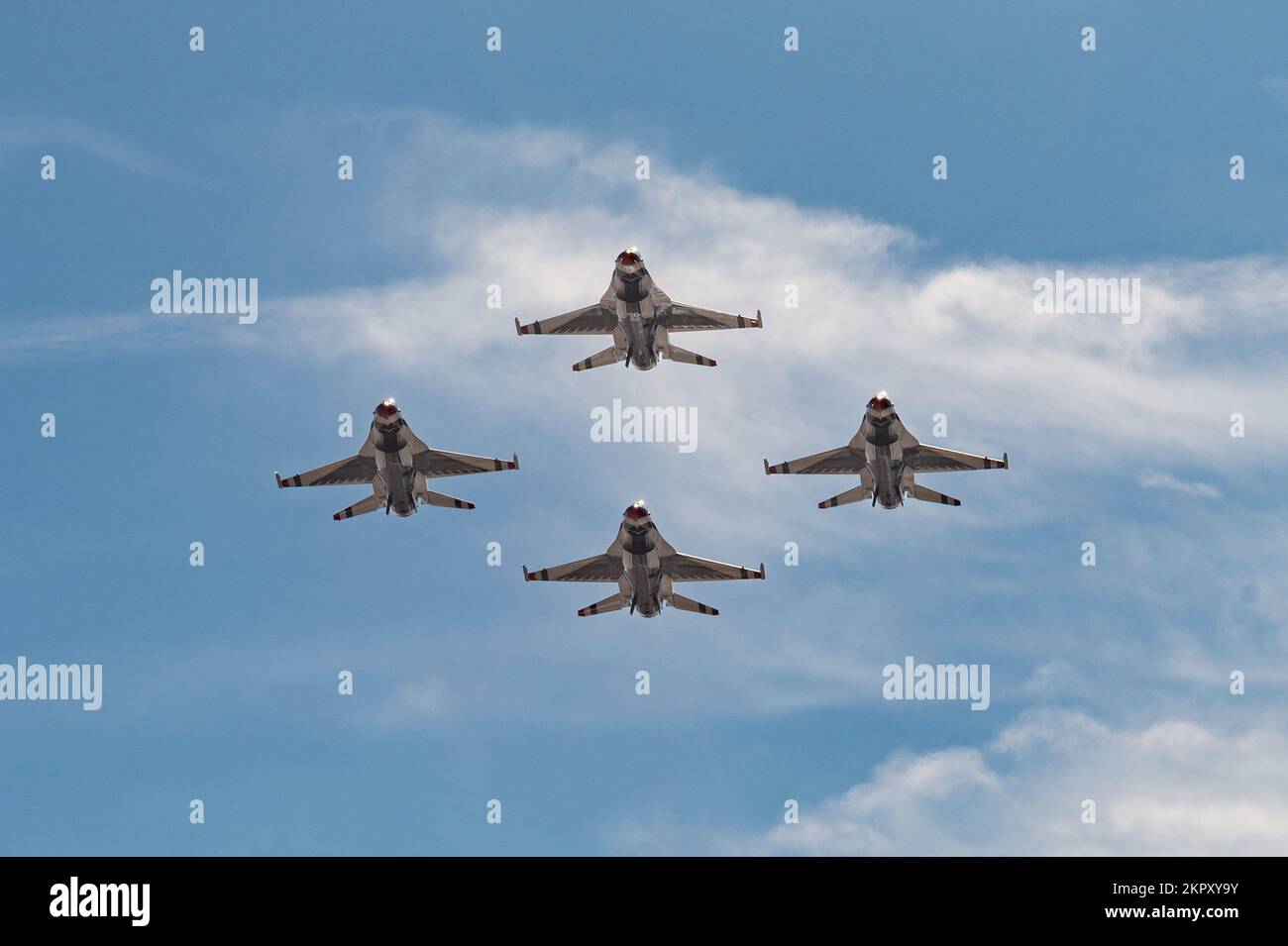 Four F-16 Fighting Falcon fighter jets assigned to the U.S. Air Force ...