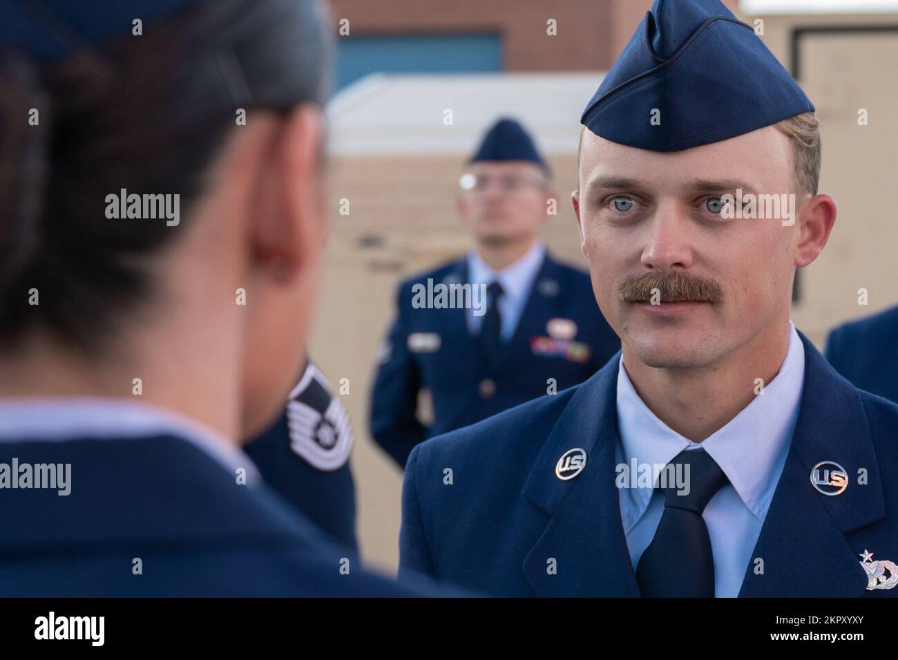 Members of the 162nd Logistics Readiness Squadron wait in formation ...