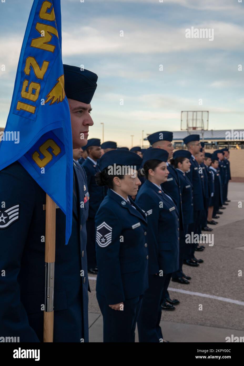 Members of the 162nd Logistics Readiness Squadron wait in formation ...