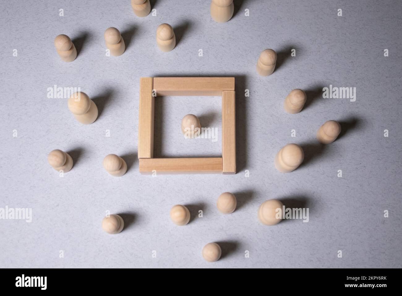 Person isolating in solitude separated behind a walls concept for being ...