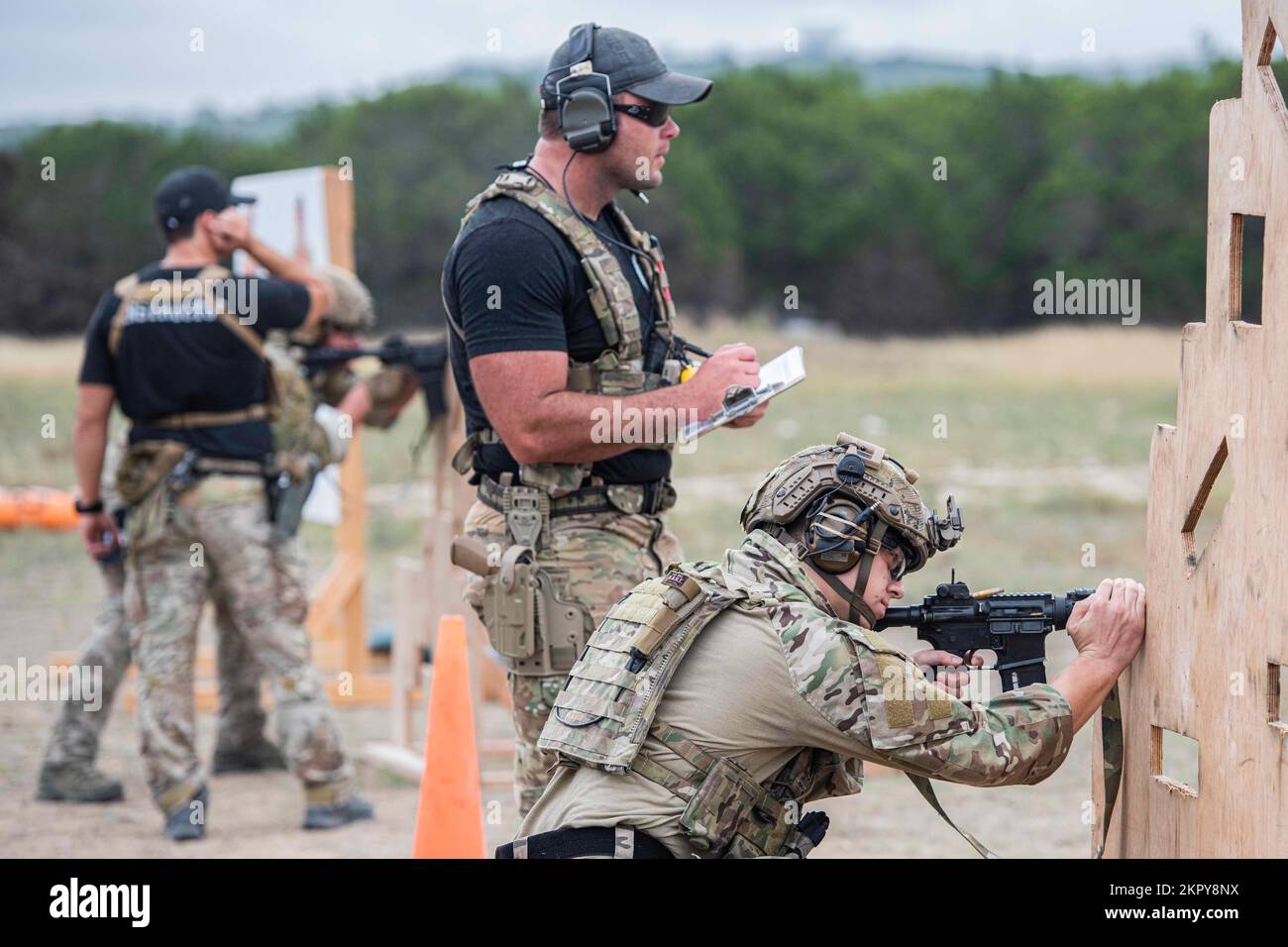 A U.S. Air Force Tactical Air Control Party (TACP) specialist fires his ...
