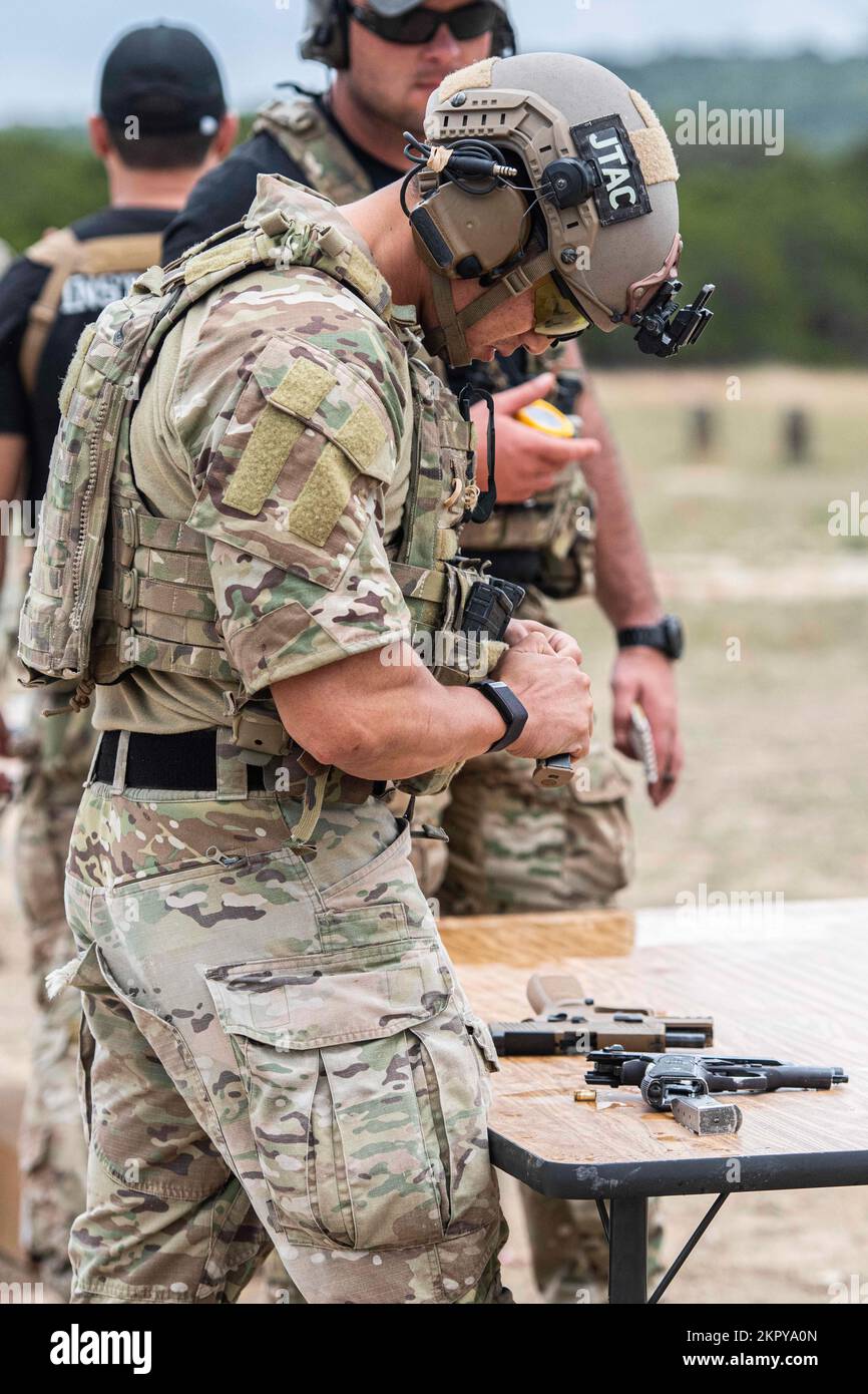 A U.S. Air Force Tactical Air Control Party (TACP) specialist fires his ...