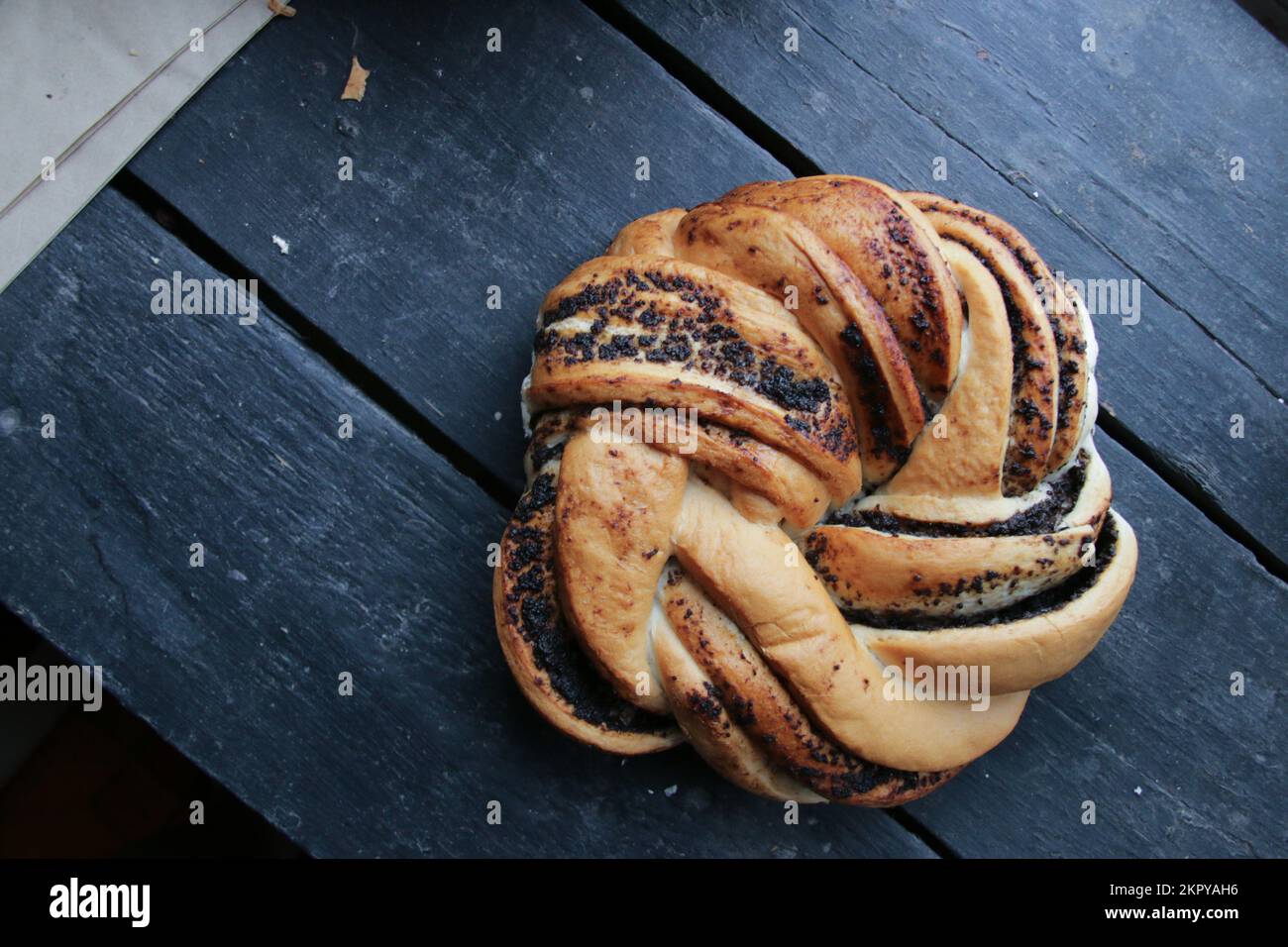 Sweet roll with poppy seeds Stock Photo - Alamy