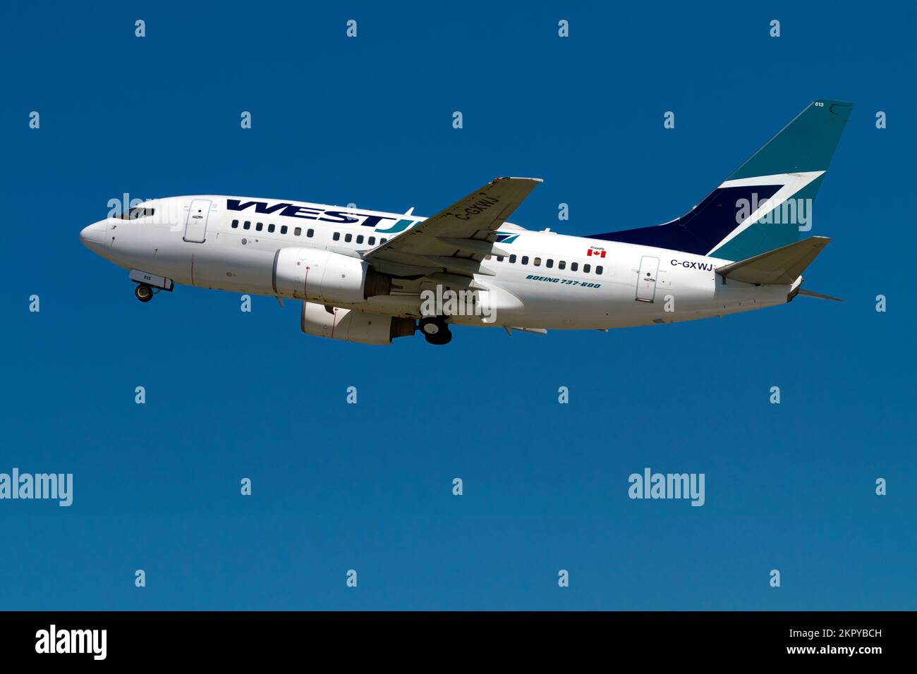 A WestJet Boeing 737-600 shortly after take off from the London ...