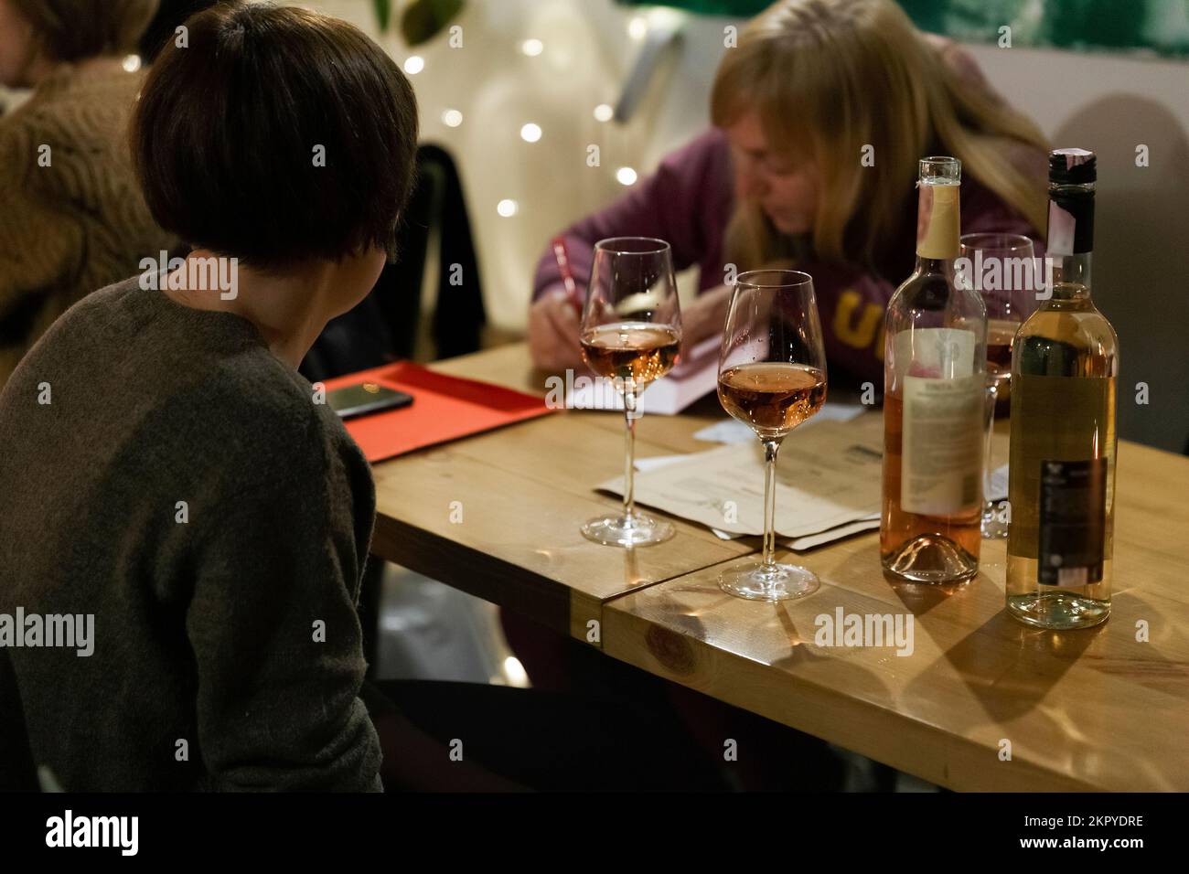 Meeting friends in a restaurant or cafe with wine and snacks Stock ...