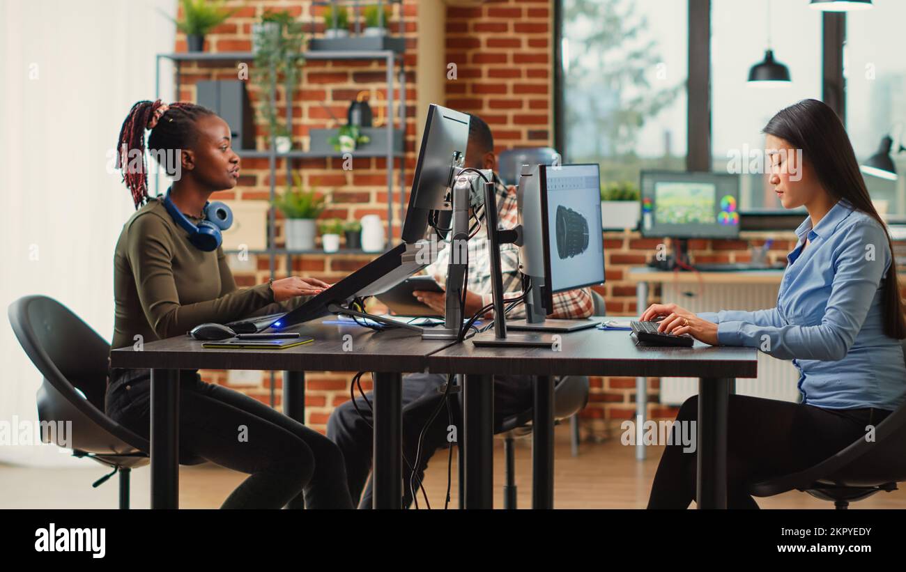 Group of professional editors working with artificial intelligence on ...