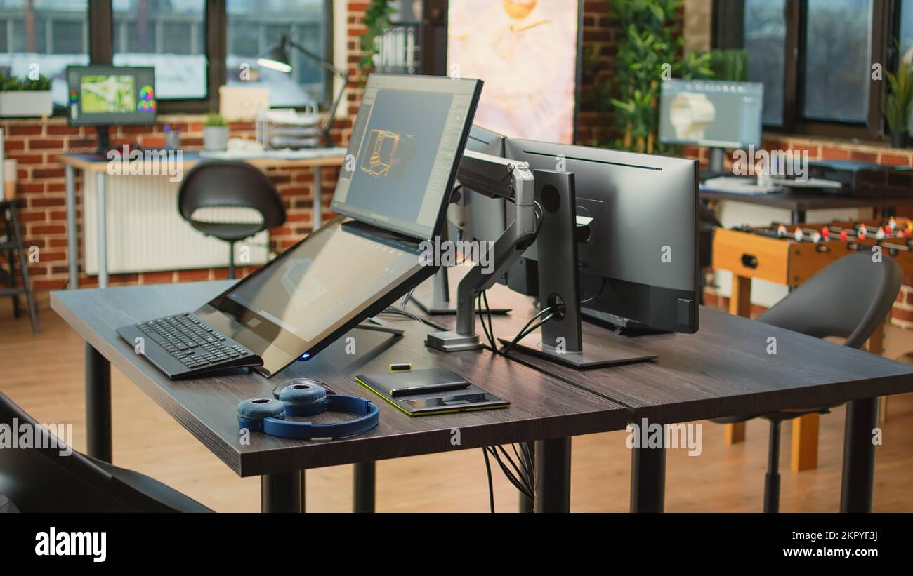 Empty creative agency office with computers to work on 3d and ...