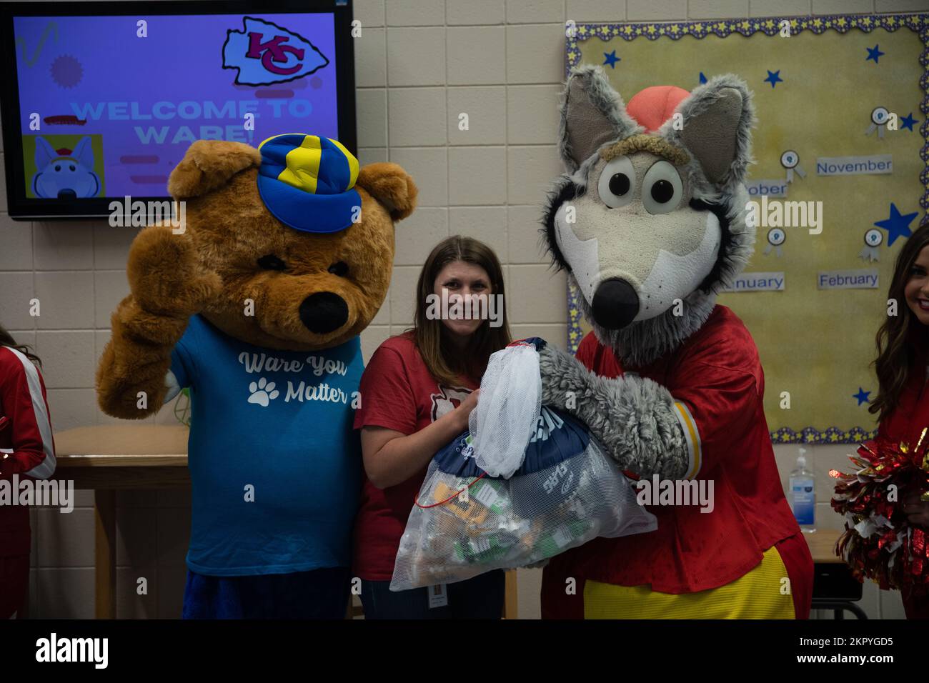 The Ware Elementary School mascot, Warebear, stands with Veronica Wait ...
