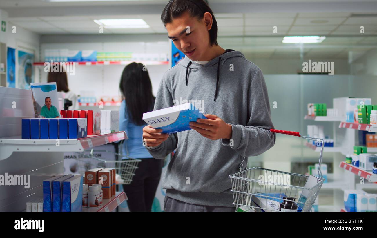 Male client checking boxes vitamins hi-res stock photography and images ...