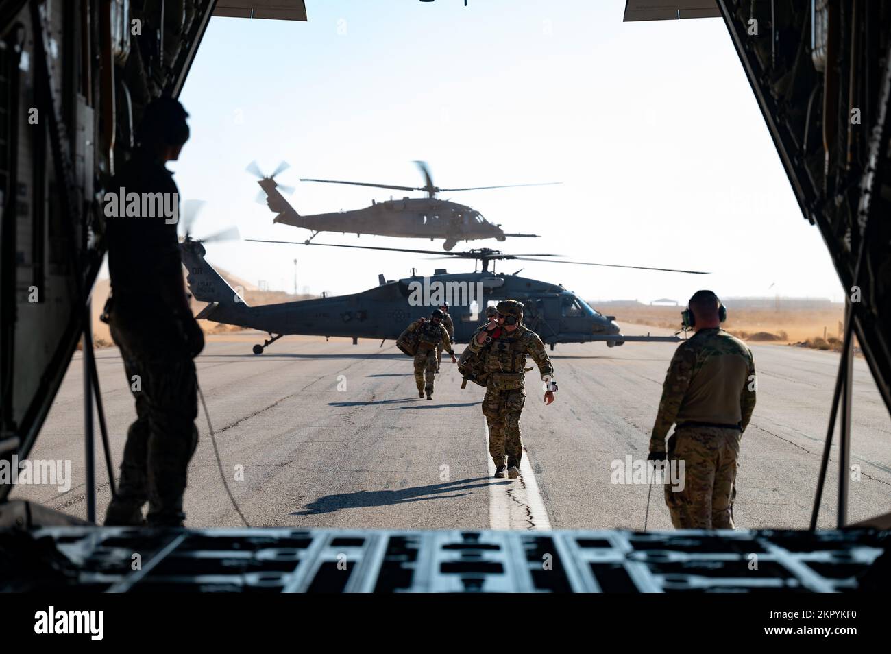 U.S. Air Force Tech. Sgt. Michael Gesford and Tech. Sgt. Jeremy Rhodes ...
