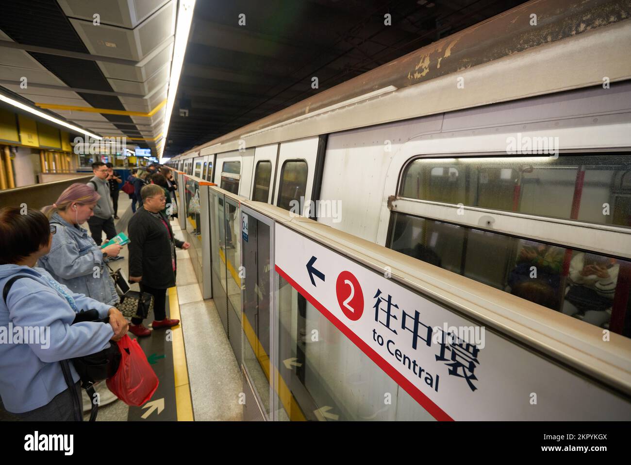 HONG KONG - CIRCA DECEMBER, 2019: train arrives at MTR station in Hong Kong. The Mass Transit ...