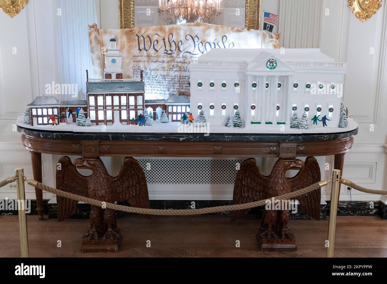 The 2022 Gingerbread White House is displayed on the eagle pier table ...