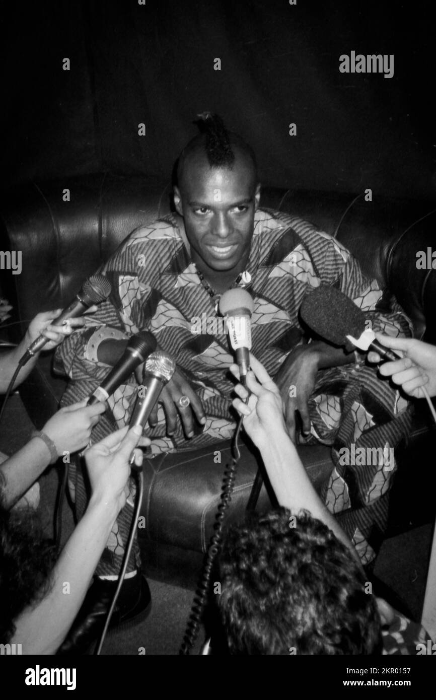 Angelo Moore, singer of the band Fishbone, surrounded by microphones ...