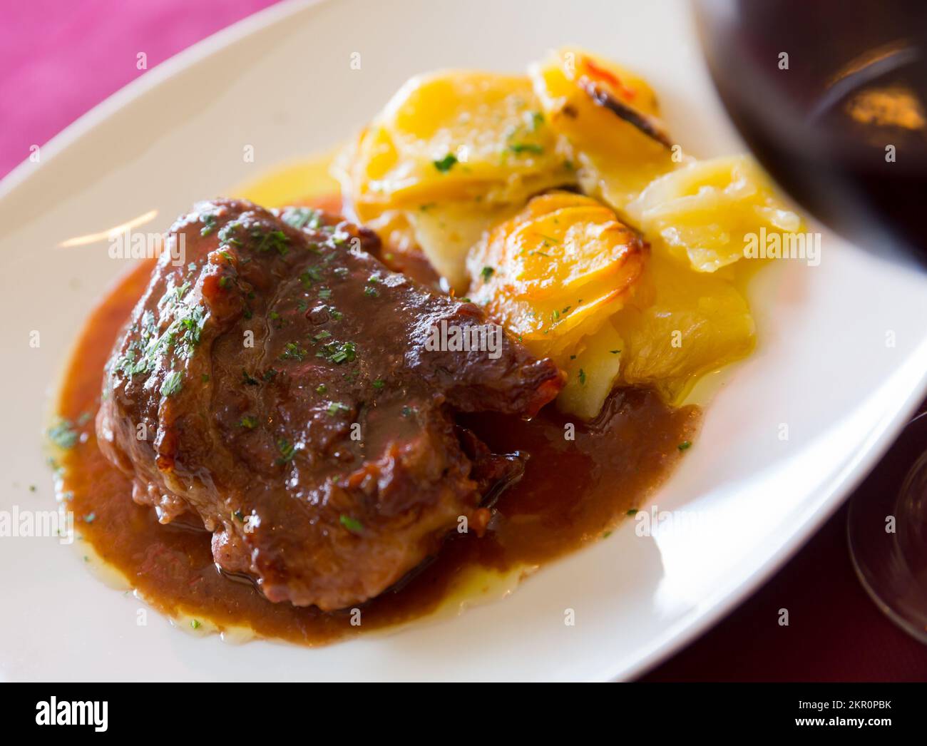 Pork cheeks in dark chocolate Stock Photo - Alamy