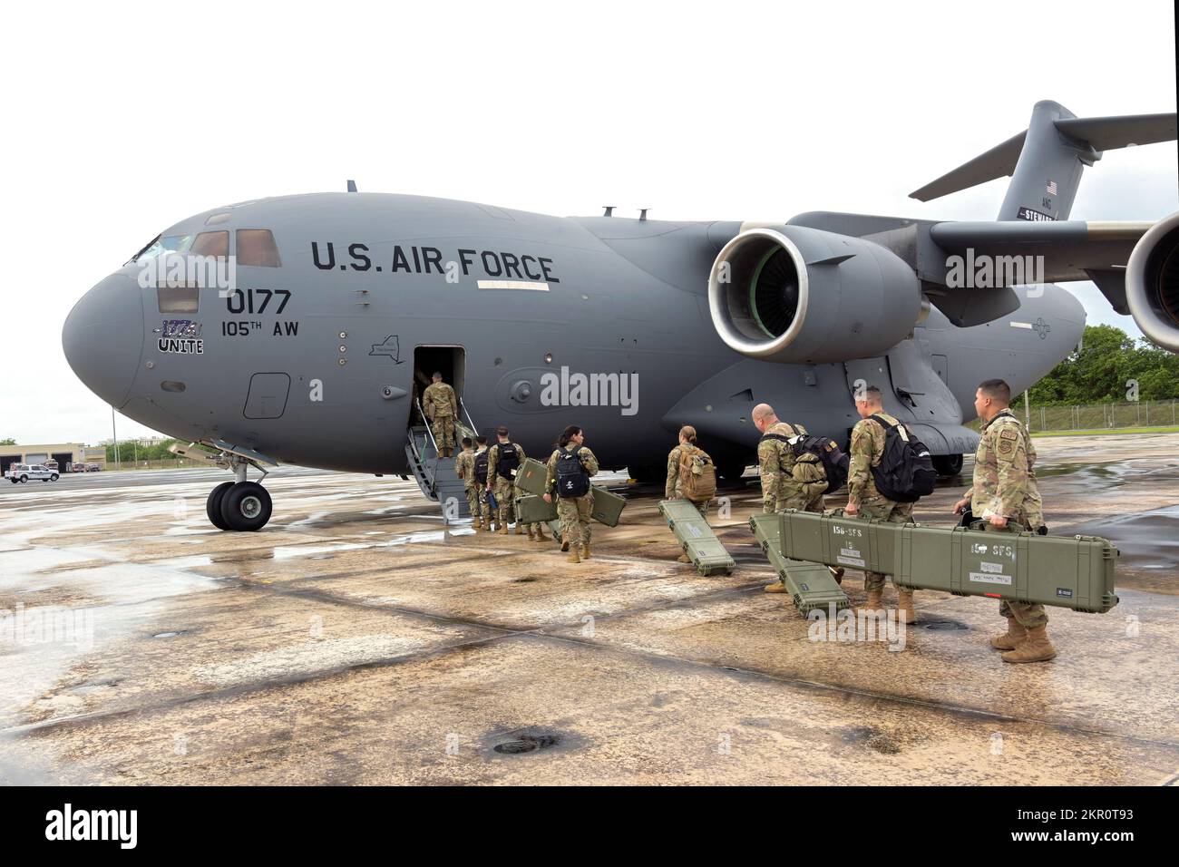U.S. Airmen with the 156th Wing, Puerto Rico Air National Guard, board ...