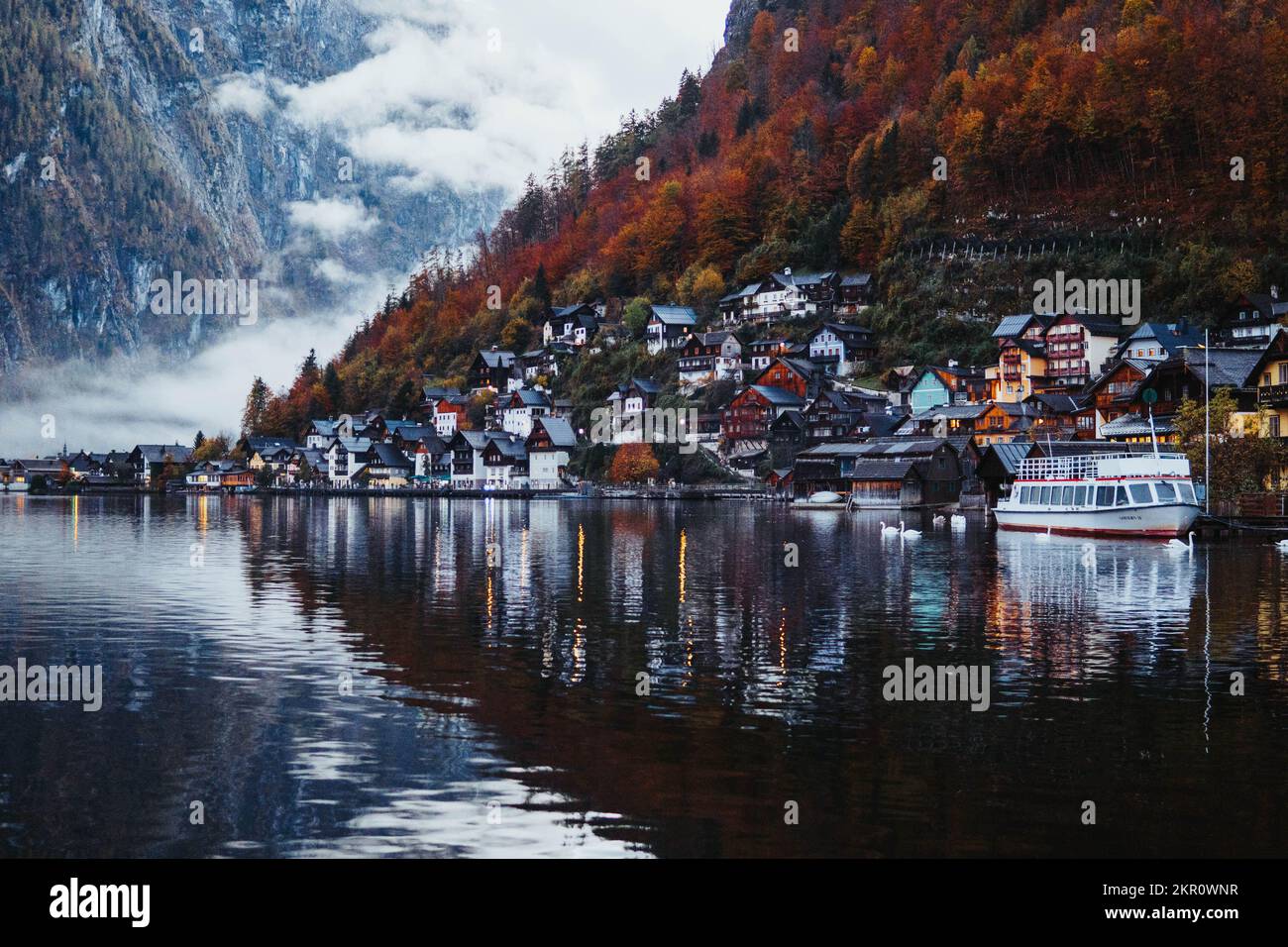 hallstatt town dusk seen from the lake at night Stock Photo - Alamy