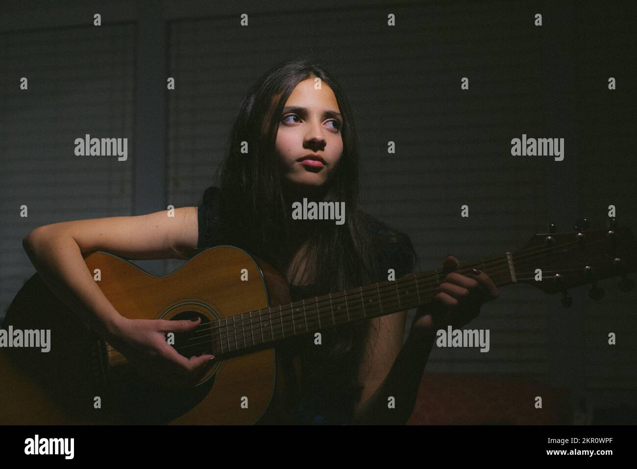 Portrait Of Teen Girl With Acoustic Guitar Stock Photo - Alamy