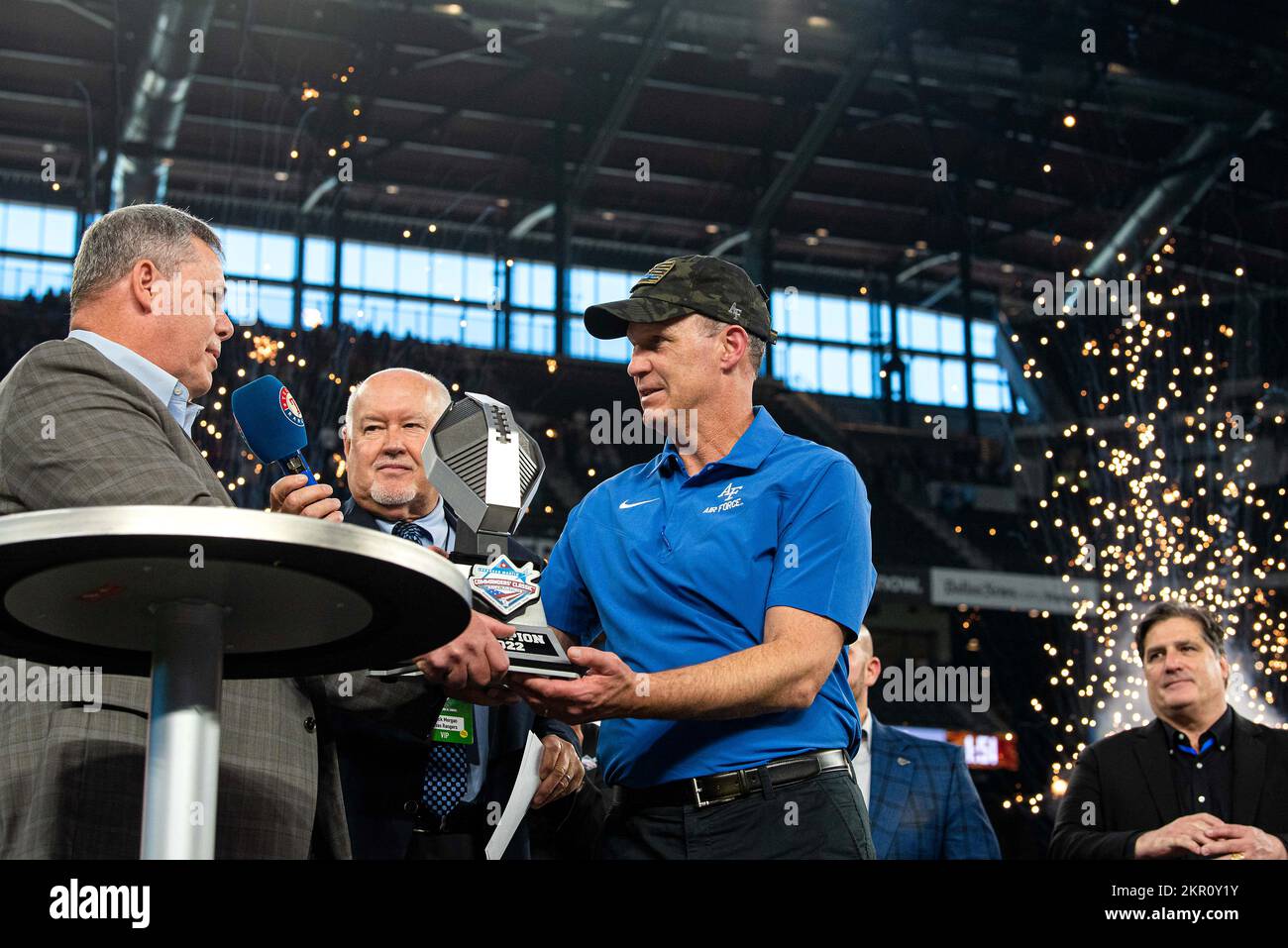 U.S. AIR FORCE ACADEMY, Colo. – Air Force coach Troy Calhoun is handed ...