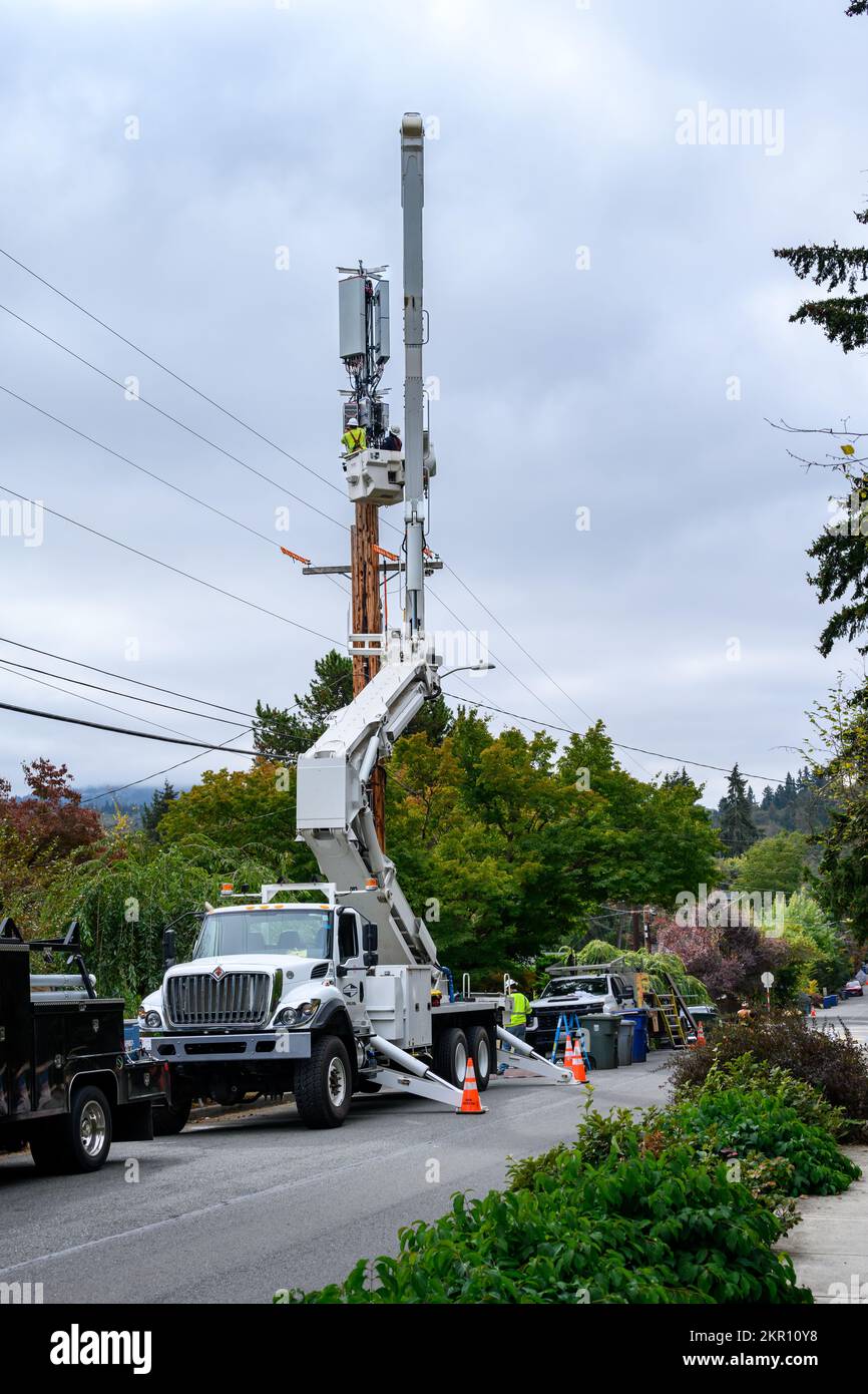 BELLEVUE, WA, USA – SEPTEMBER 30, 2022: Work trucks and crews ...