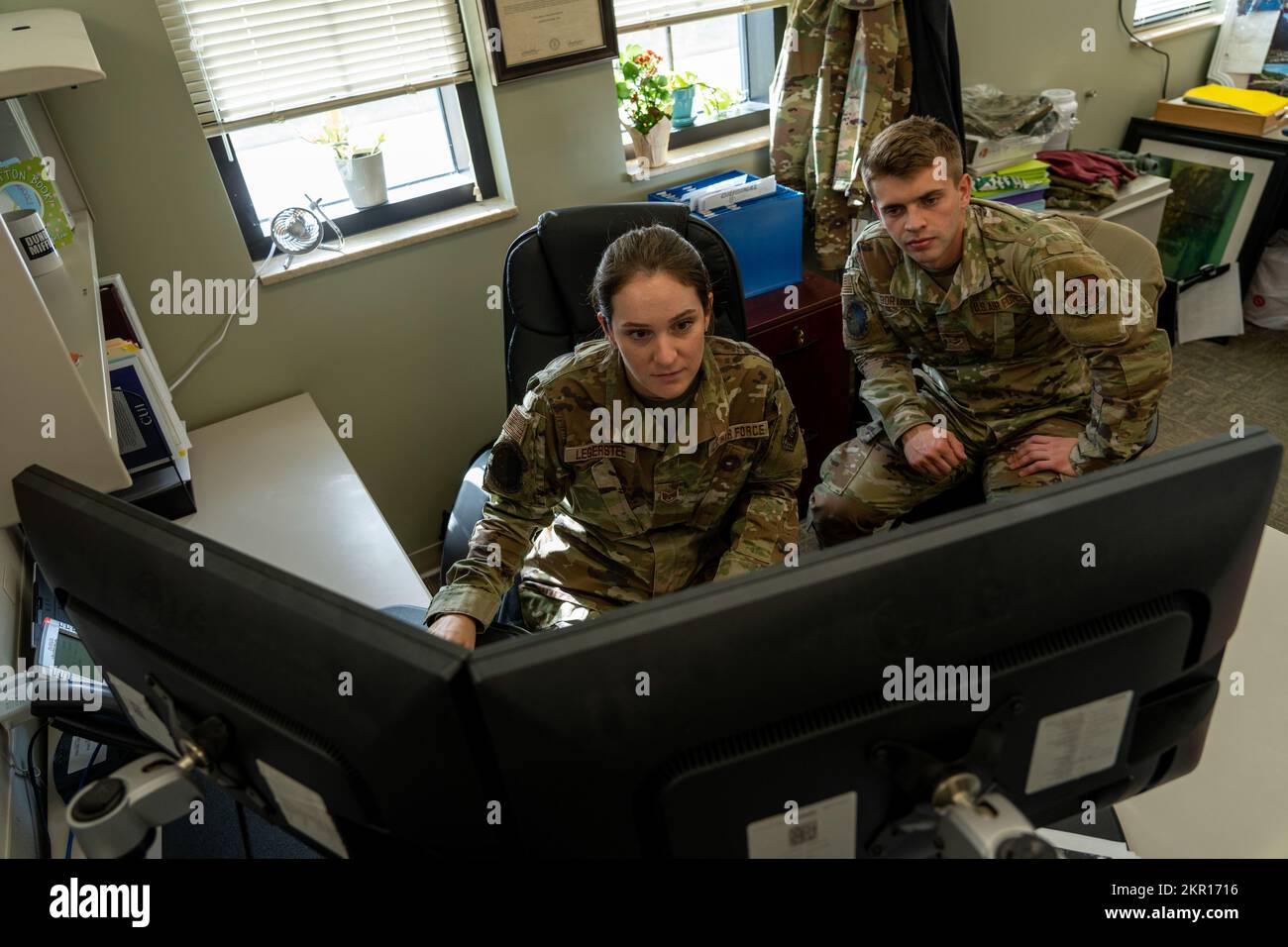 Staff Sgt. Katlyn Legerstee trains Airman 1st Class Christian Bortnick ...