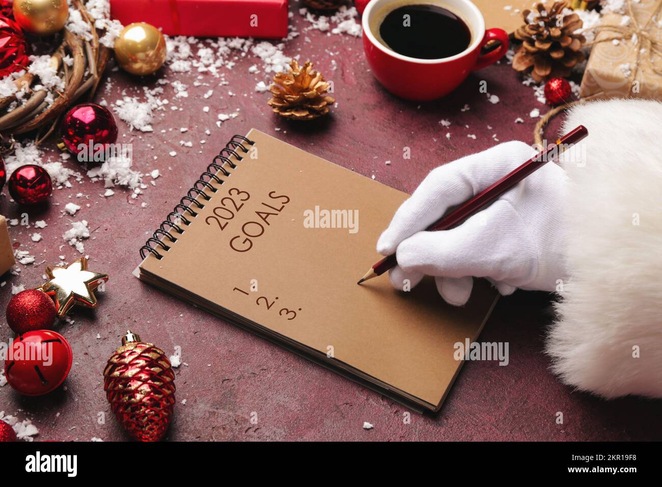 Santa Claus making to-do list for year 2023, closeup Stock Photo - Alamy