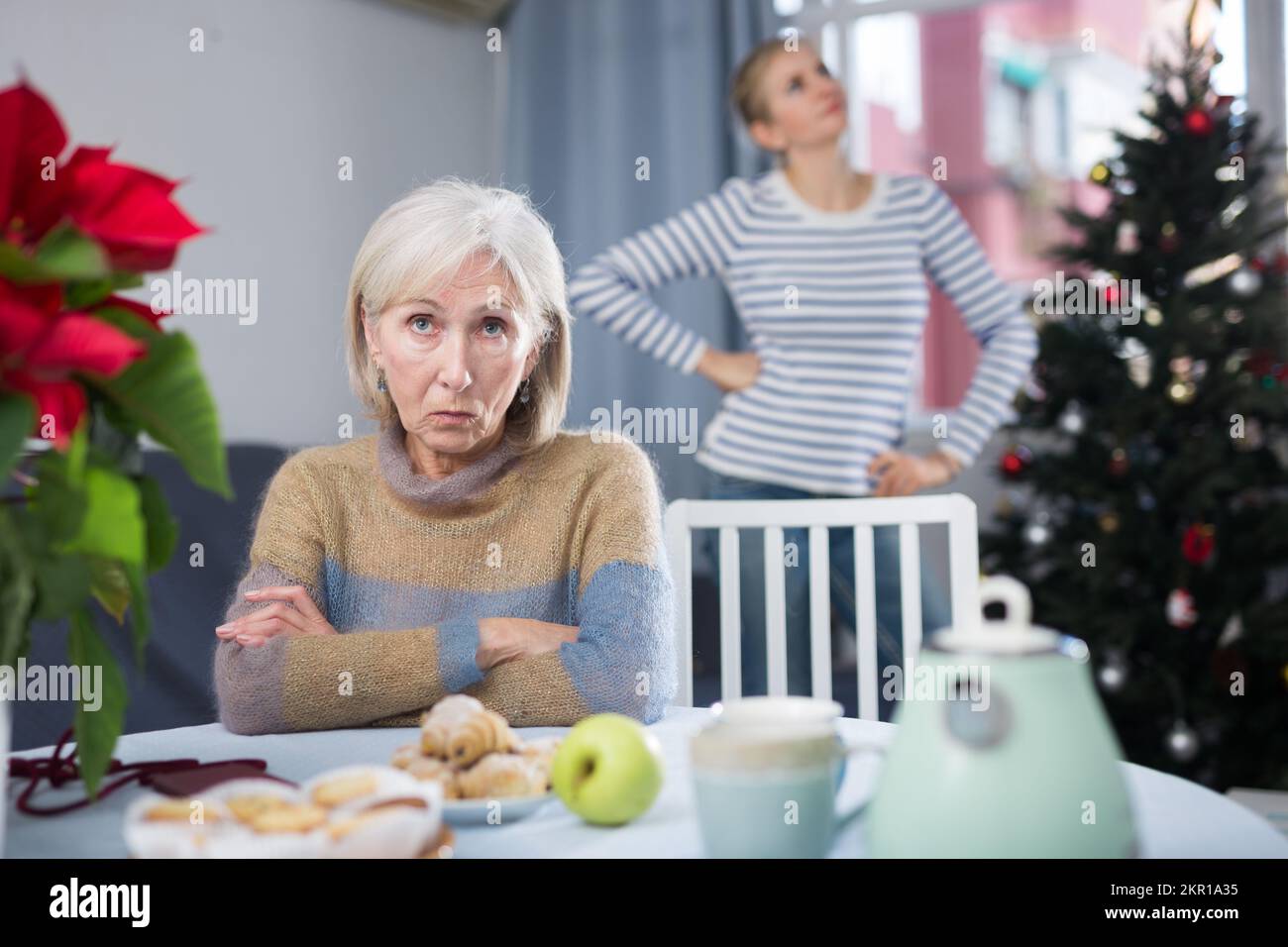 Domestic quarrel between an elderly mother and an daughter on Christmas ...