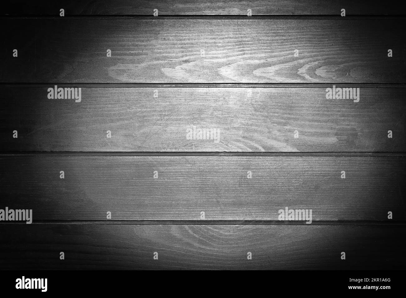 Backlight on black wooden texture as background Stock Photo - Alamy