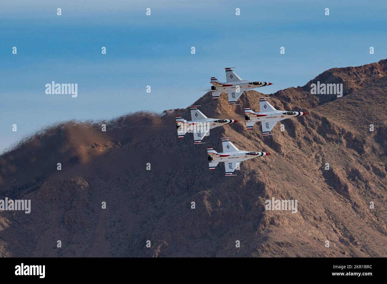 Four F-16 Fighting Falcon fighter jets assigned to the U.S. Air Force ...