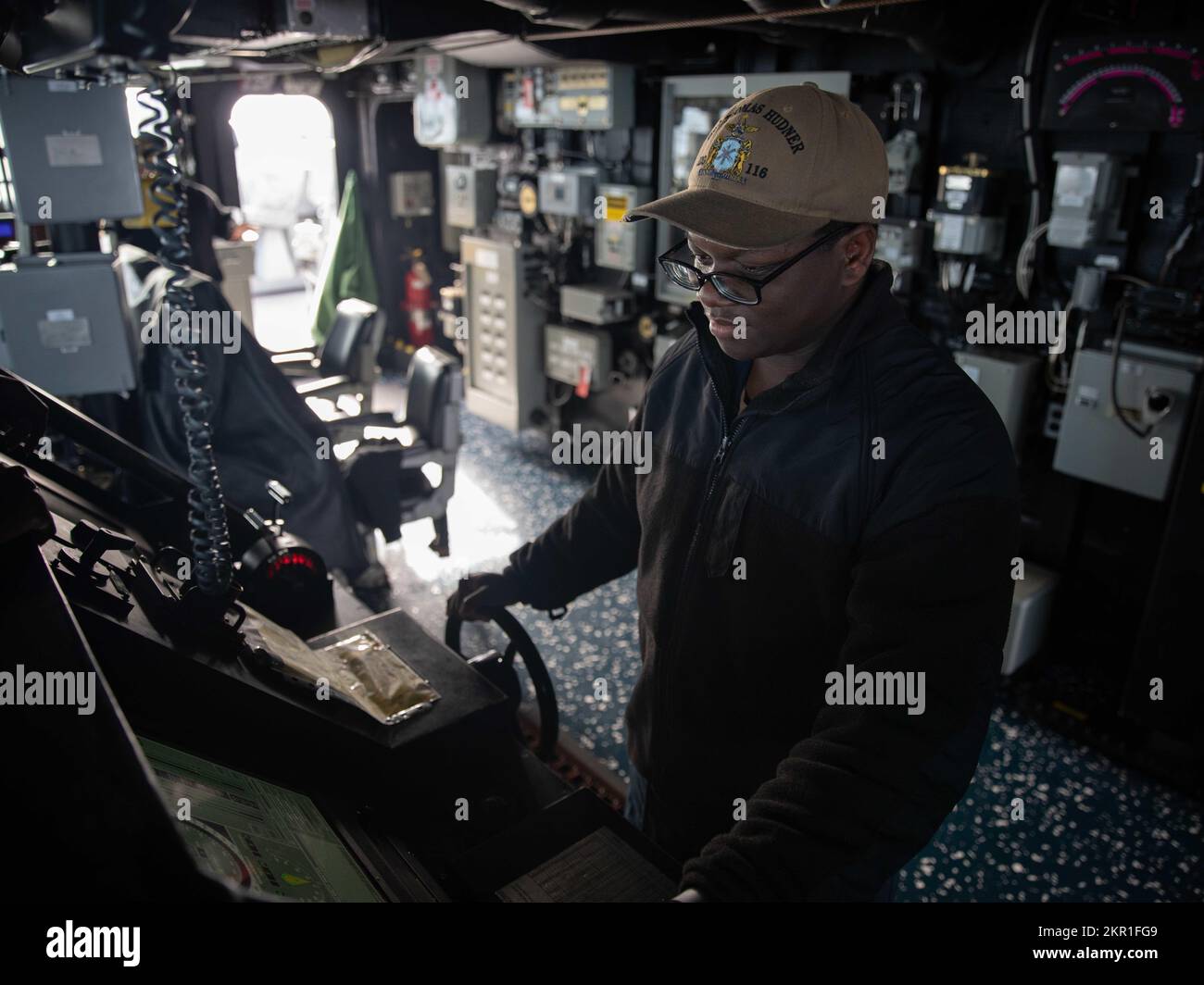 Boatswain’s Mate Seaman Apprentice Kurtis Taylor mans the helm in the ...