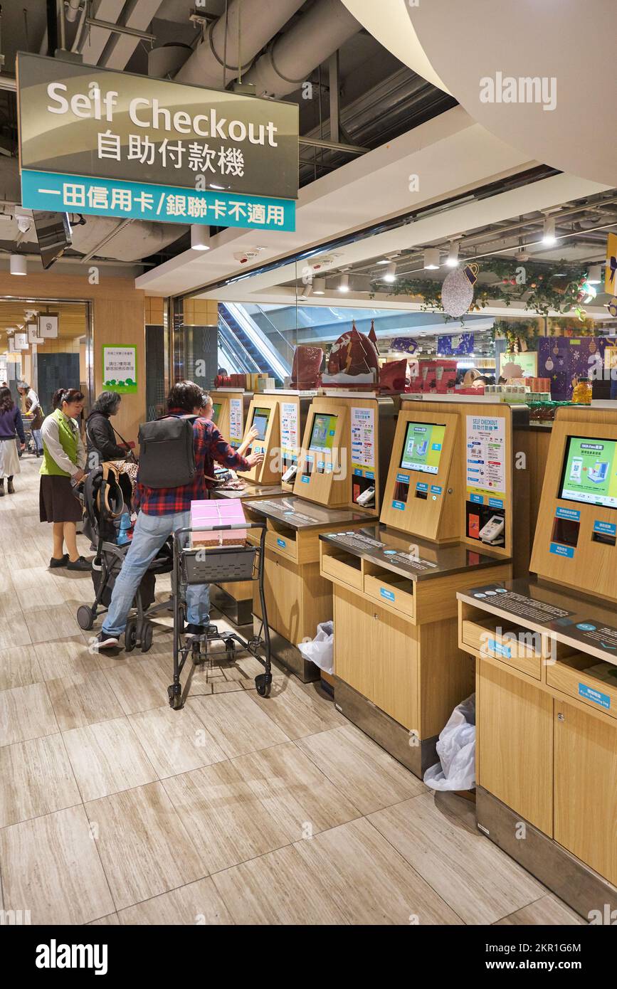 HONG KONG - CIRCA DECEMBER, 2019: self checkout kiosks at YATA ...