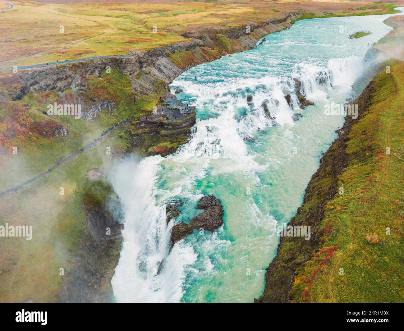 Overlooking the waterfall, tourist standing at a view point above the ...