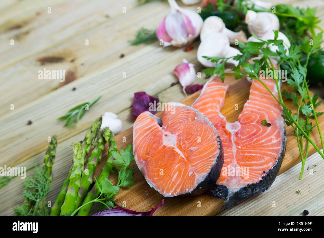 Food frame with fish and vegetables Stock Photo - Alamy