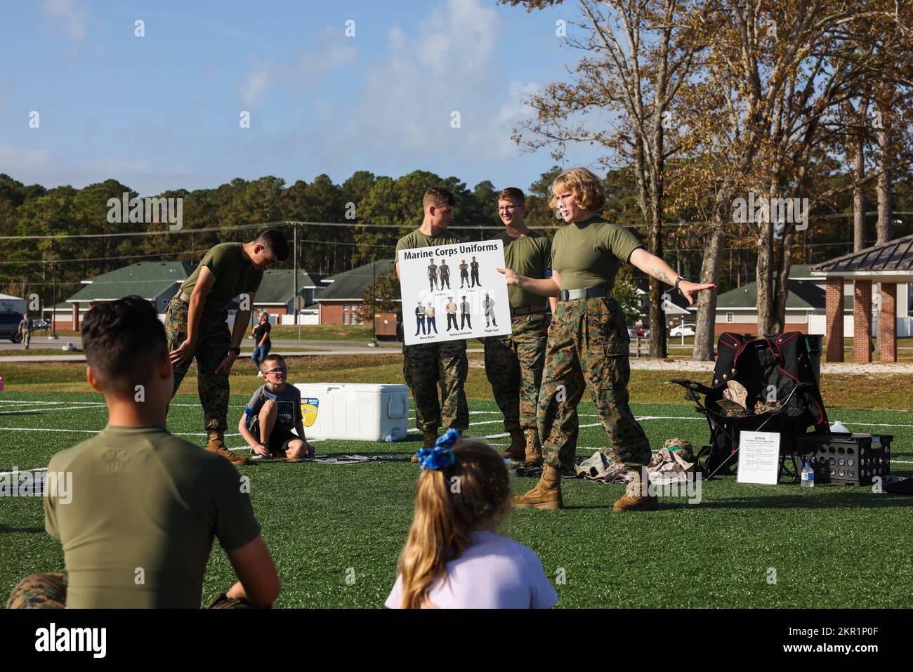 A group of U.S. Marines teach young participants about Marine Corps ...